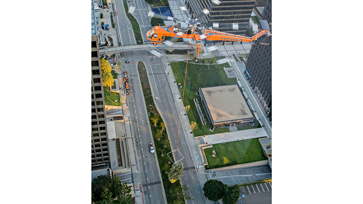 BrightView installs trees with helicopter - Lawn & Landscape